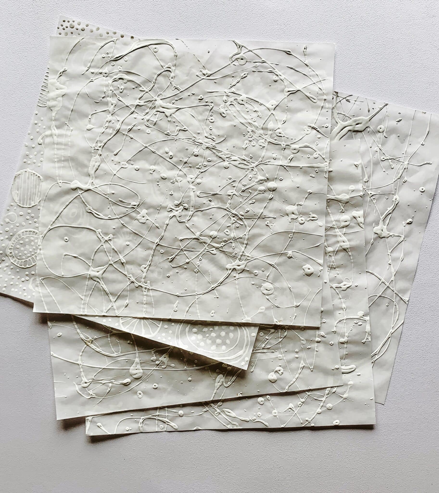 Creating mixed media collage papers using deli/butter/bakery papers ...