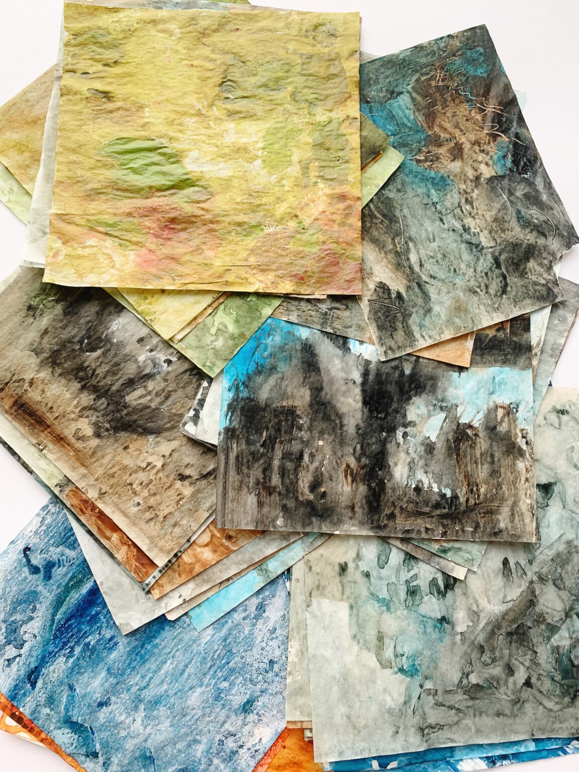 Creating mixed media collage papers using deli/butter/bakery papers ...